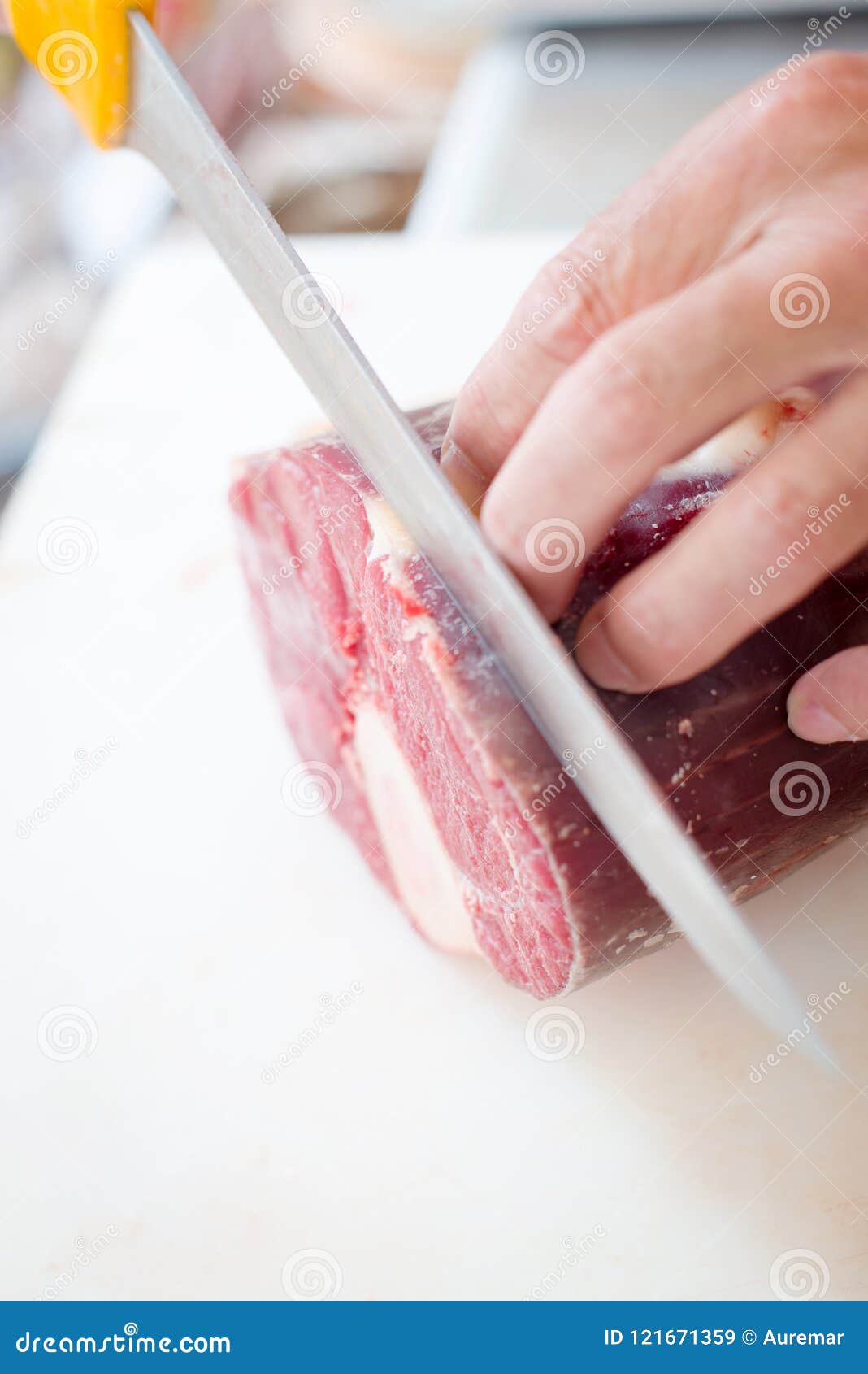 Butcher slicing some beef stock image. Image of ingredient - 121671359