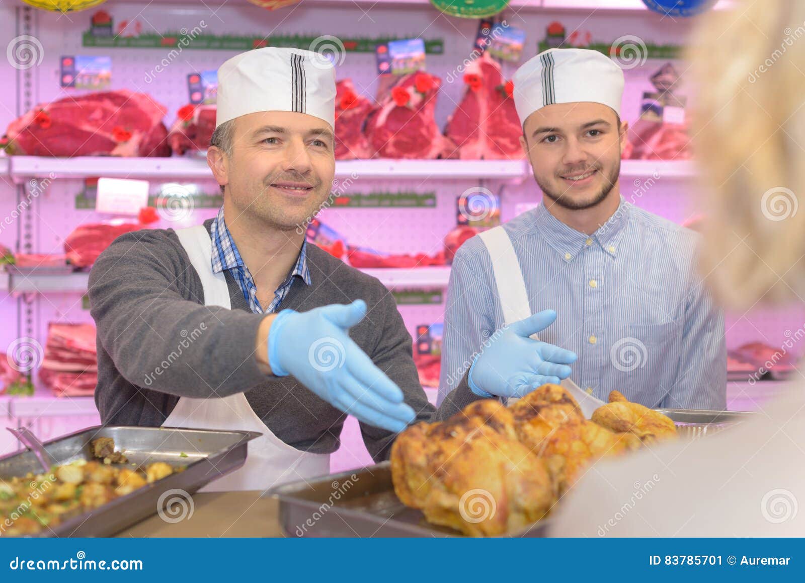 Butcher Teaching Young One How To Sell Meat Stock Image - Image of ...