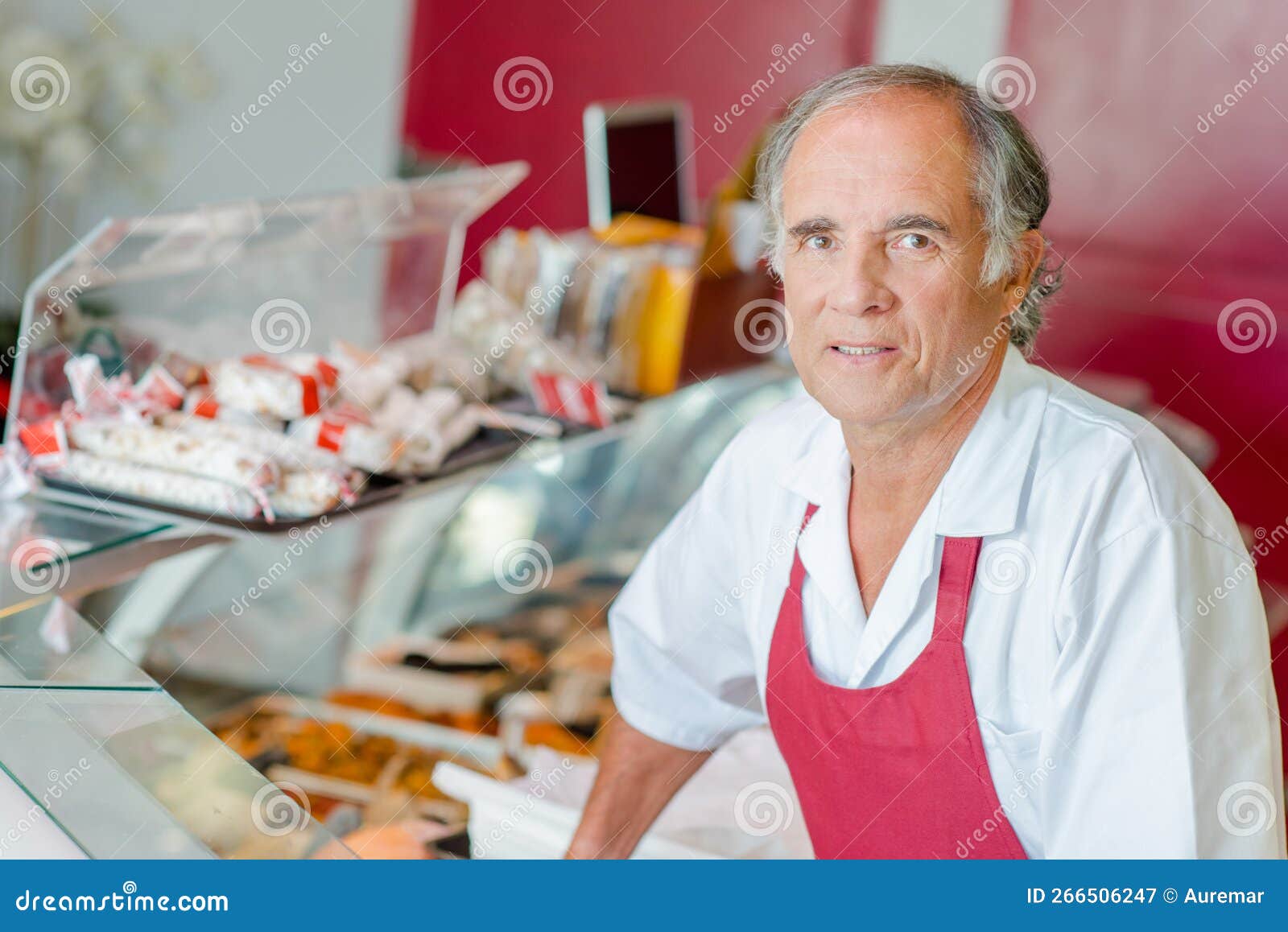Butcher at work stock image. Image of posing, counter - 266506247