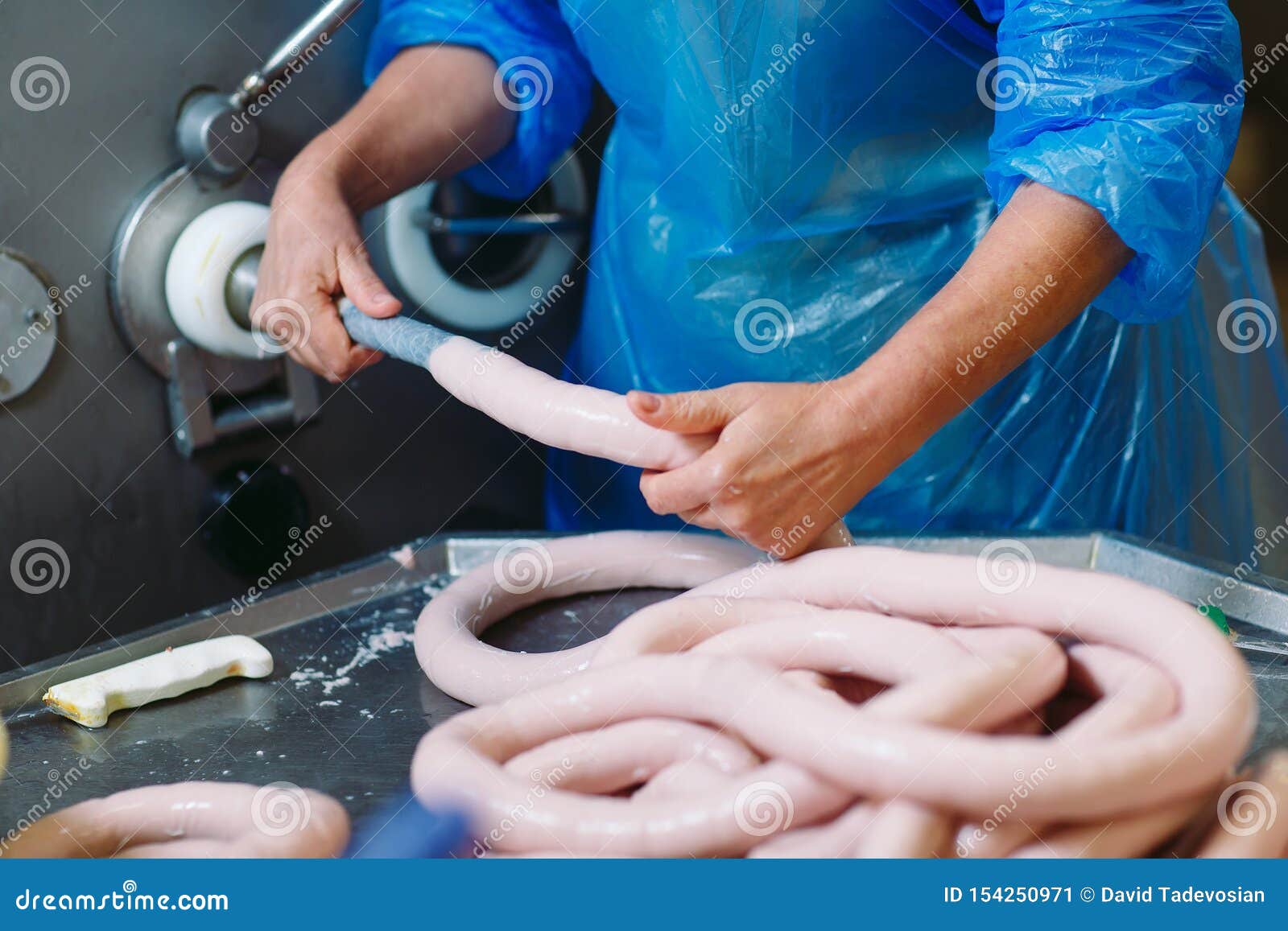 Butchers Processing Sausages at a Meat Factory. Stock Image - Image of ...