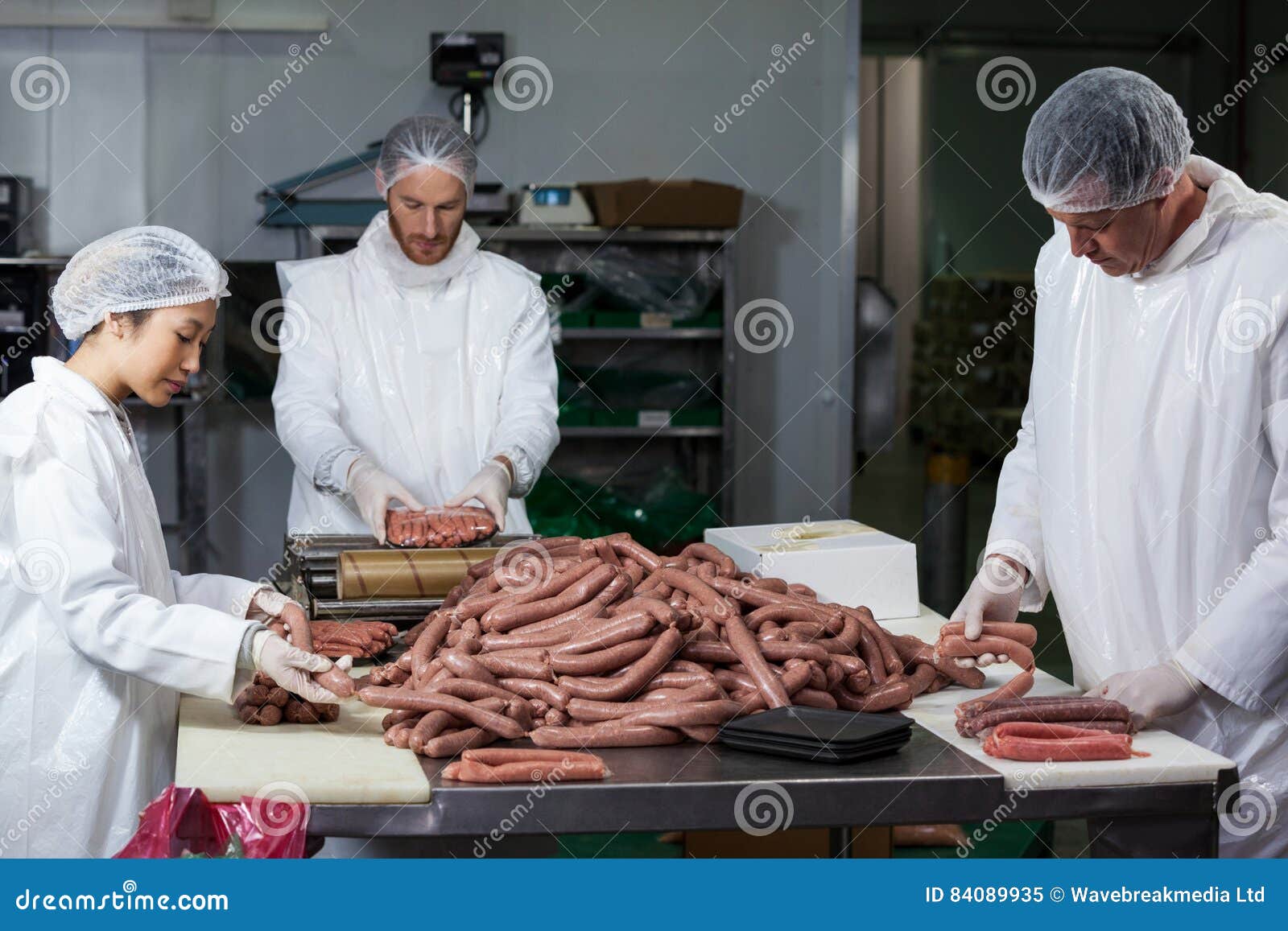 Butchers Processing Sausages Stock Image - Image of people, nutrition ...