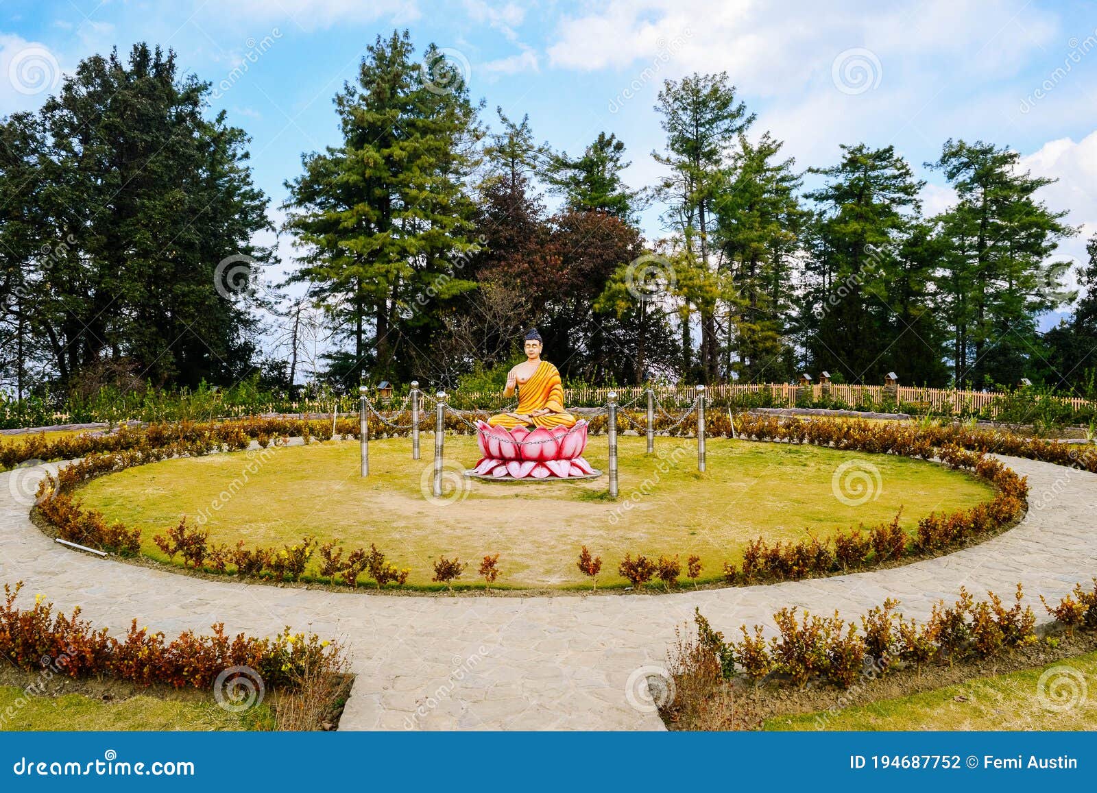 Butha Statue in a Garden with Plants Stock Photo - Image of flowers ...
