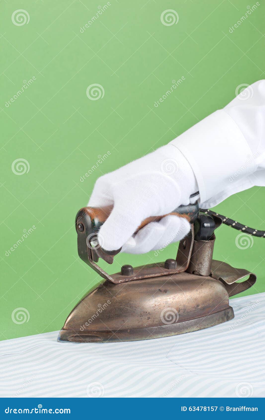 Butler ironing stock image. Image of historical, green - 63478157
