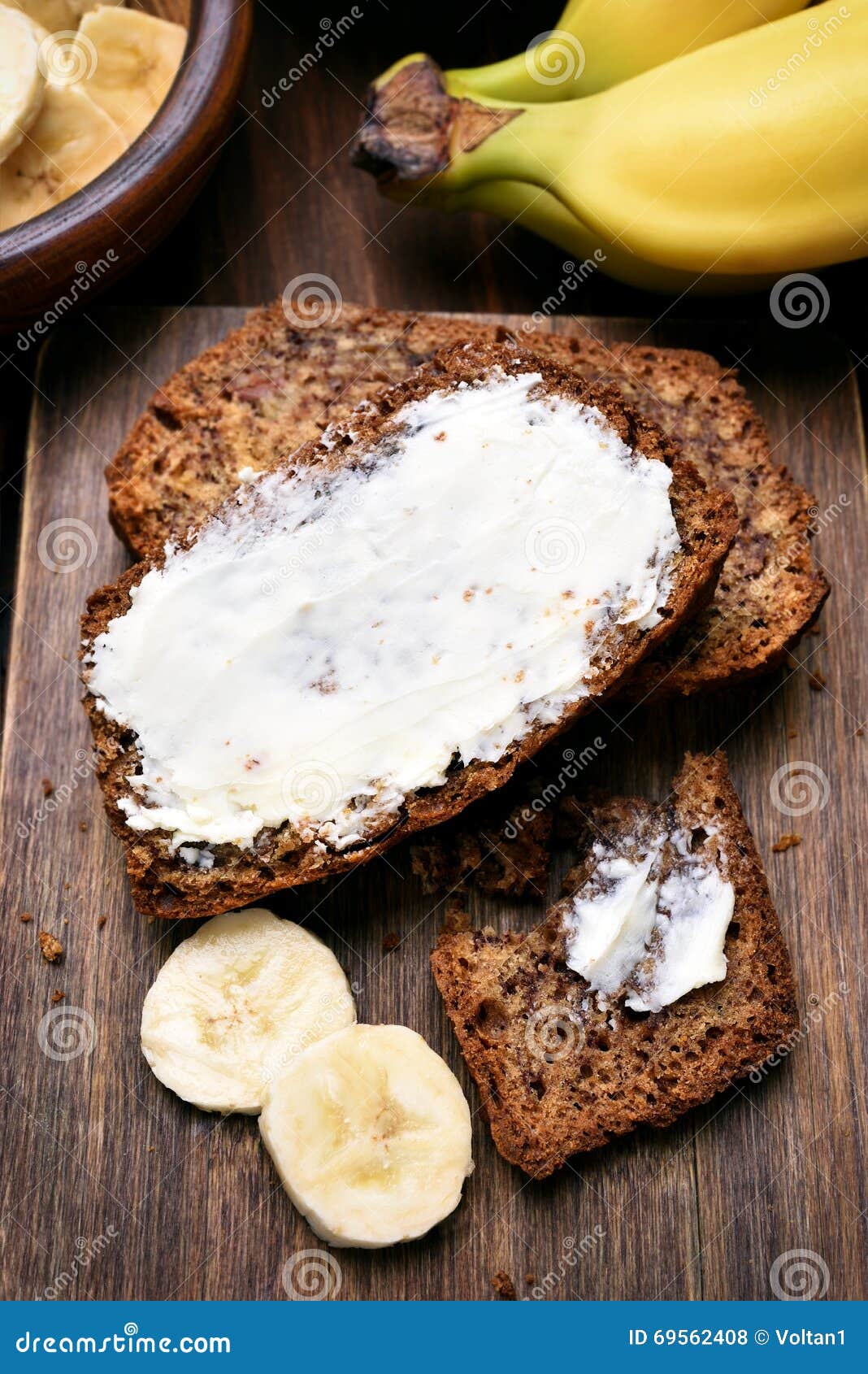 Butter on banana bread stock photo. Image of board, product - 69562408