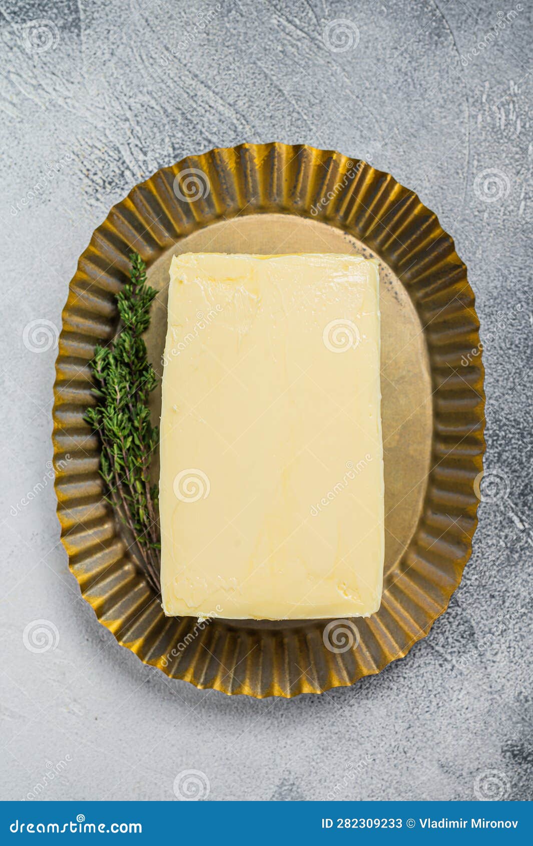 Butter Block on Steel Plate. White Background Stock Image - Image of ...