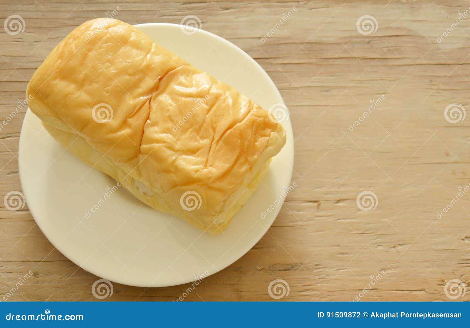Butter Bread Loaf on White Dish Stock Photo - Image of dish, breakfast ...