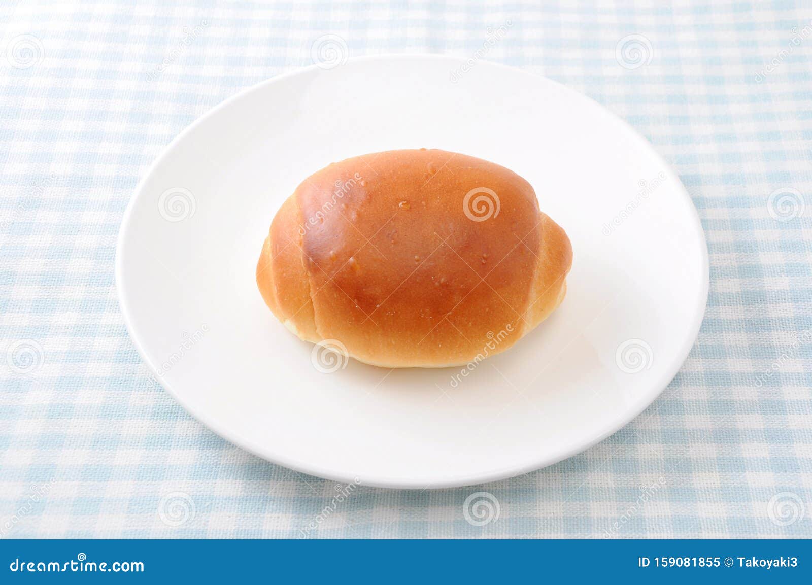 Butter Bread Roll on a Plate on Tablecloth Stock Image - Image of baker ...