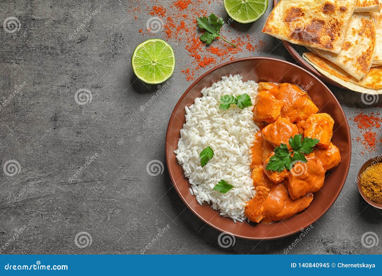 Butter Chicken with Rice Served on Grey Table, Flat Lay Stock Image ...