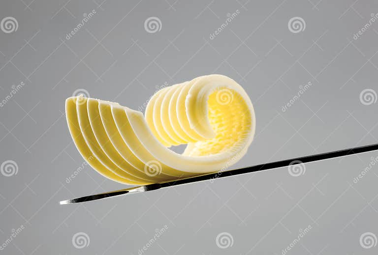 Butter curl on a knife stock image. Image of metal, food - 10451337