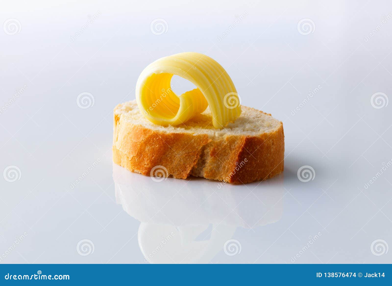 Butter Curl or Roll on Baguette Bread Stock Photo - Image of indoors ...
