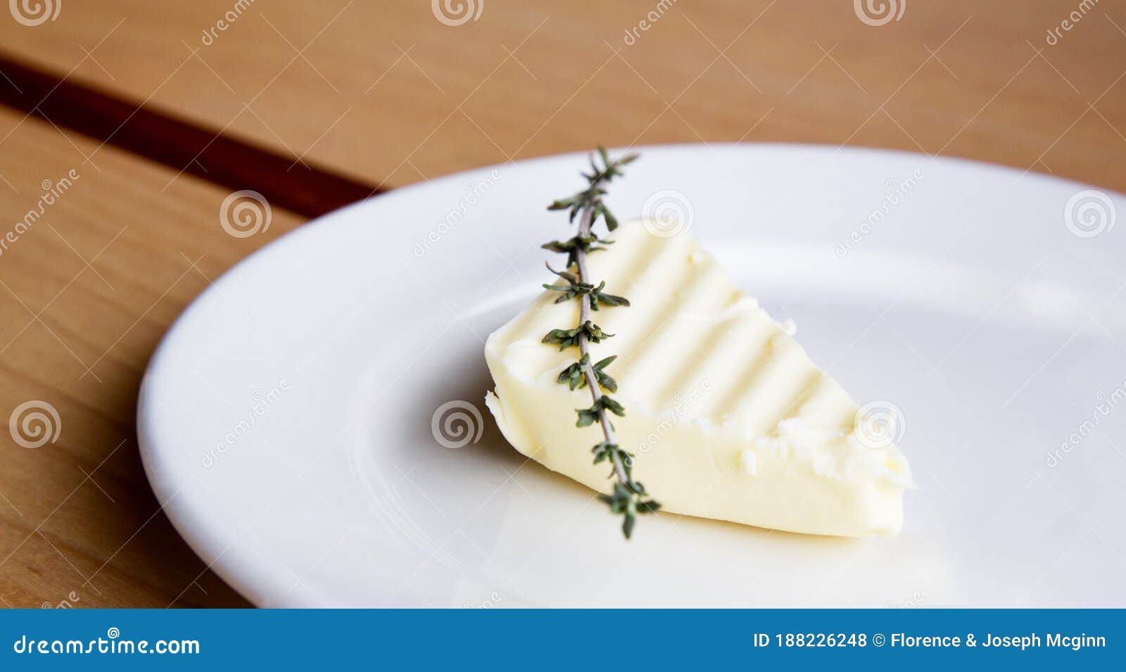 Butter Triangle with Sprig of Thyme Stock Photo - Image of people ...