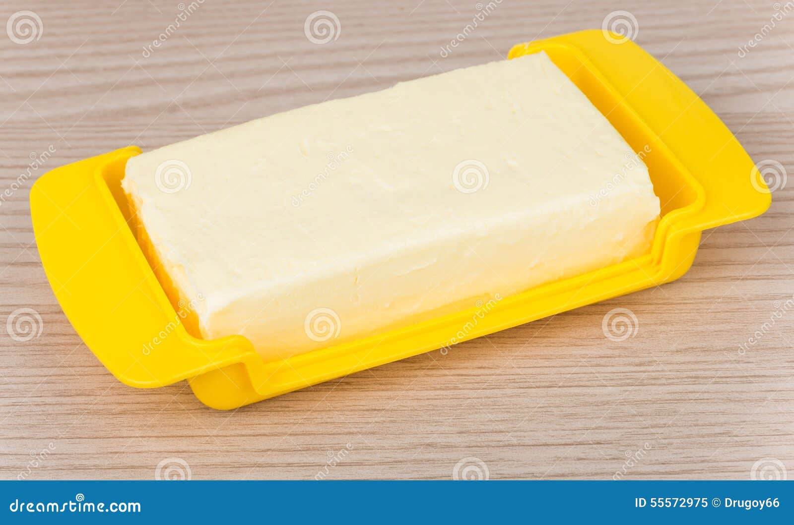 Butter in Yellow Plastic Dish on Table Stock Image - Image of object ...