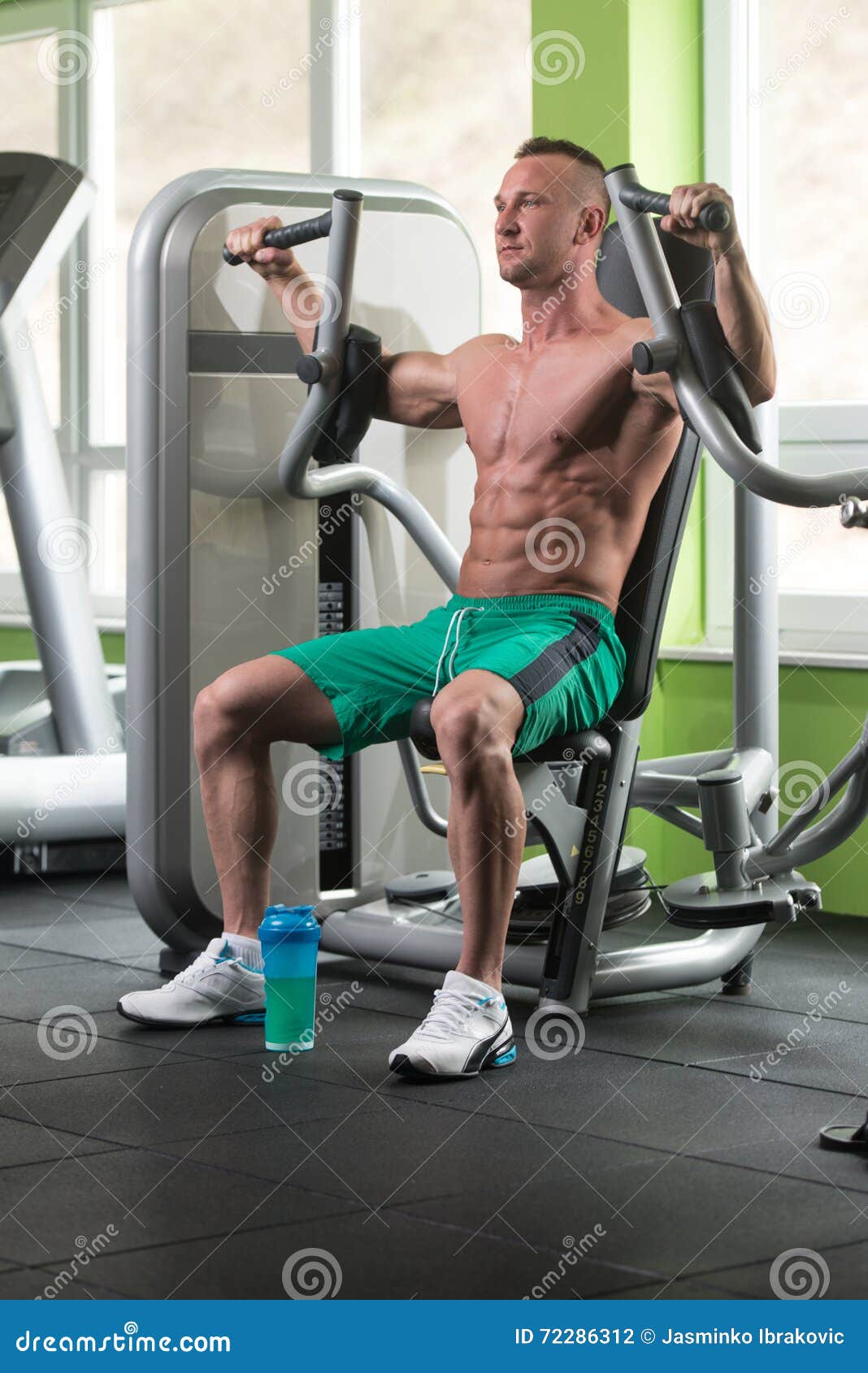 Butterfly Chest Exercise on Machine Stock Photo - Image of fitness ...