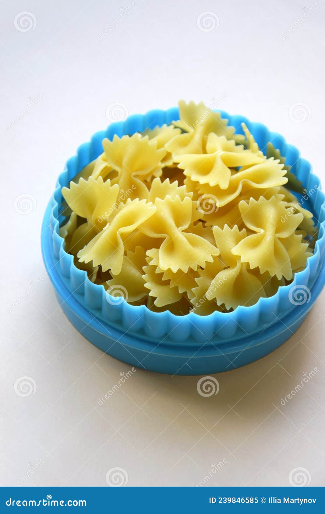 Butterfly Shaped Pasta is Stacked in a Circle Shape on the Table. Stock ...
