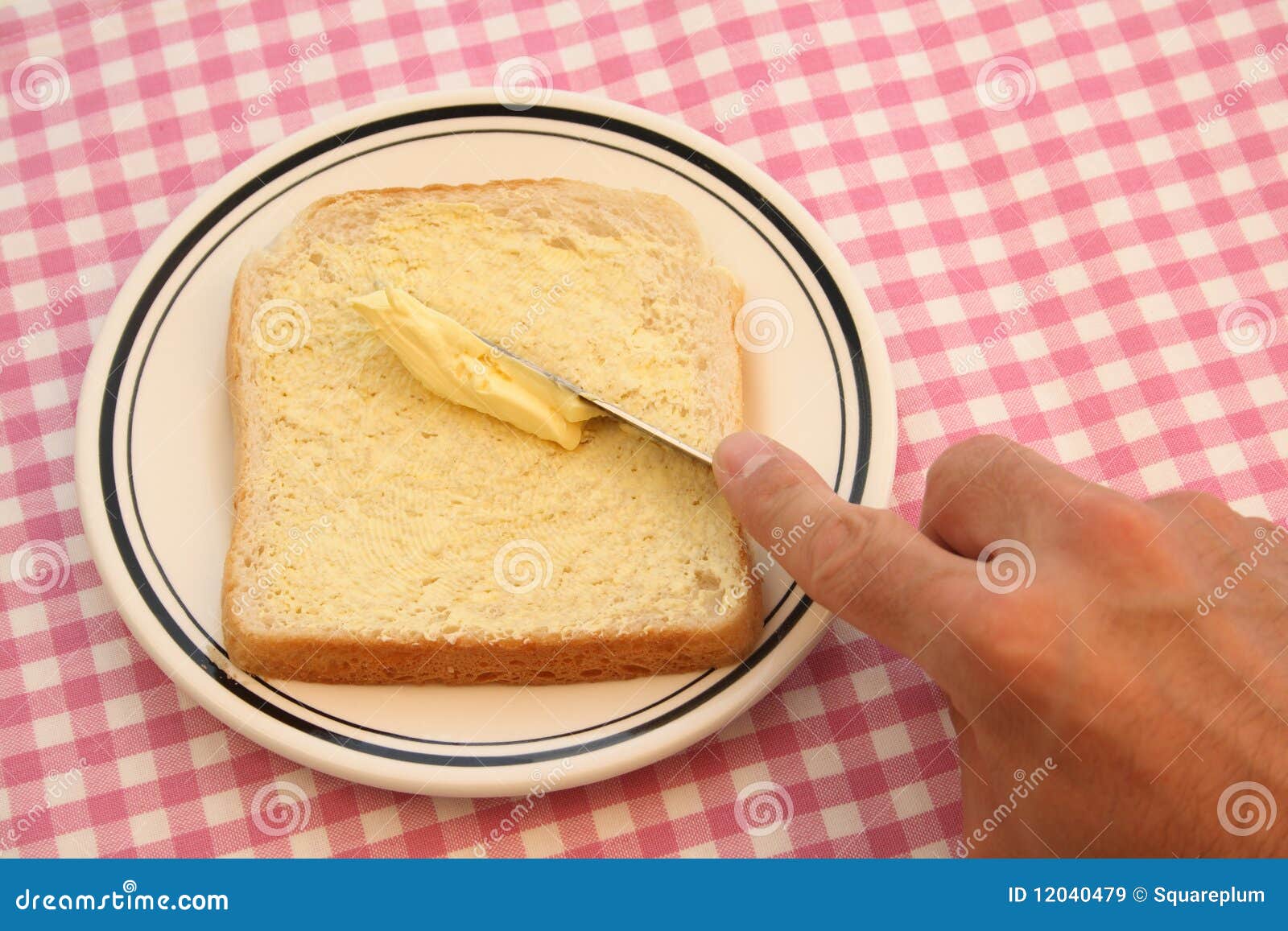 Buttering stock image. Image of nutrition, knife, checkered - 12040479