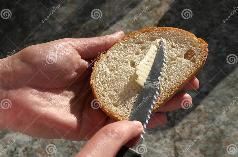 Buttering bread stock photo. Image of enegry, knife, hand - 212234