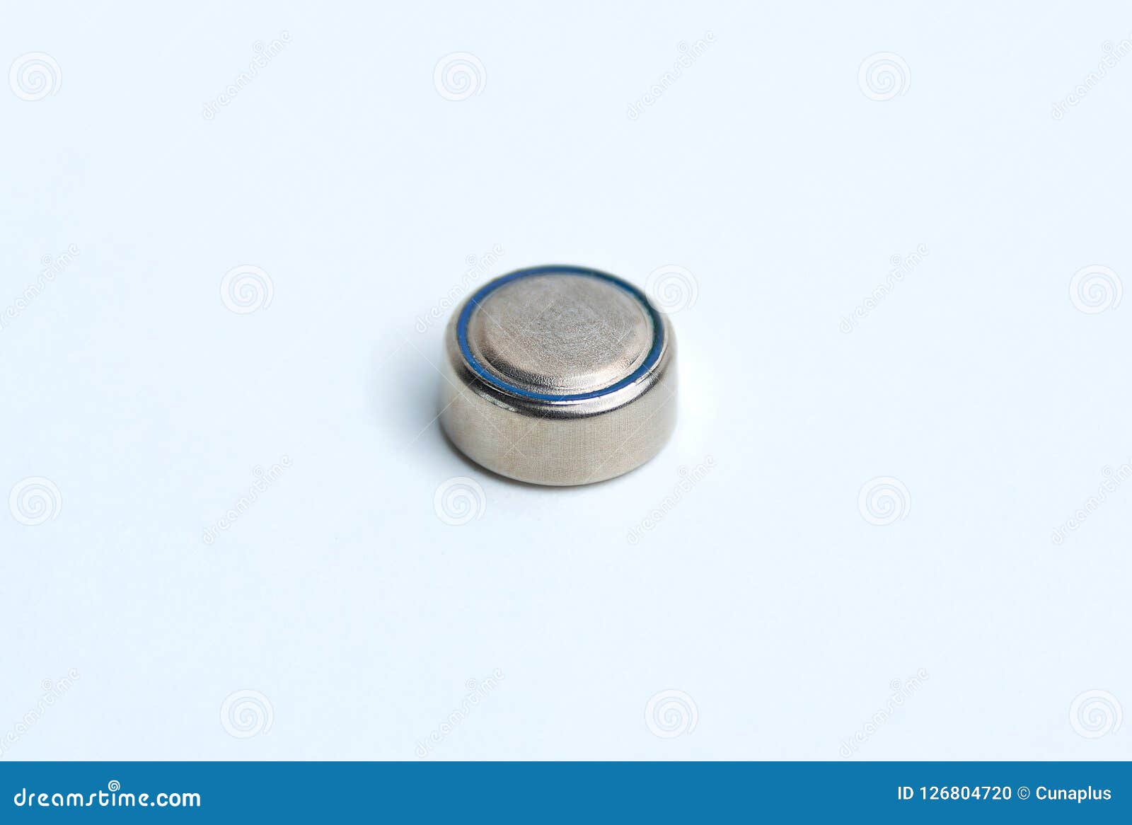Button battery stock photo. Image of electronics, electricity - 126804720