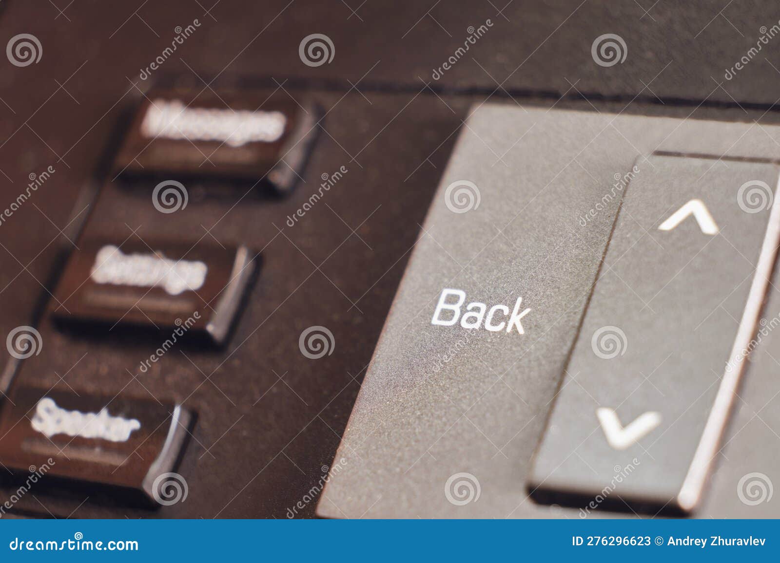 Button with the Text Back on a Landline Phone in the Office, Close-up ...