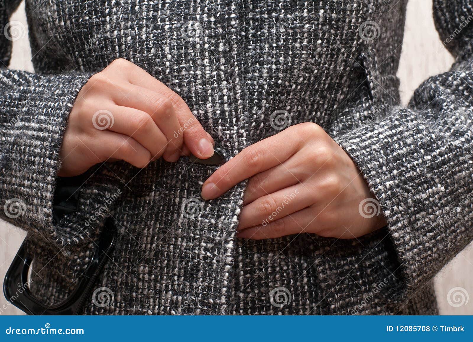 Button up her coat stock photo. Image of dressing, close - 12085708