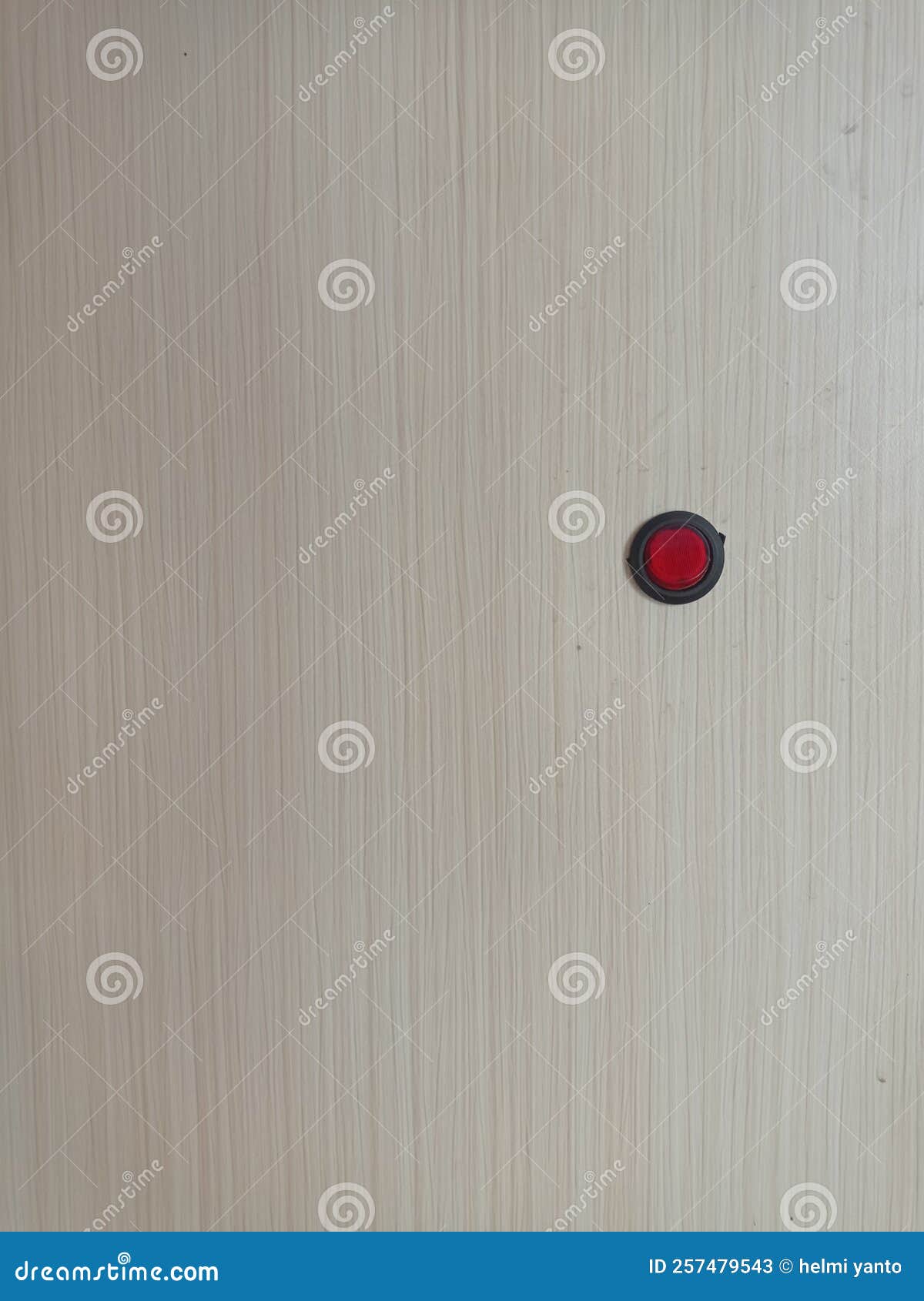 A button on a wooden wall stock image. Image of wood - 257479543