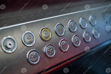 Buttons in the Elevator with Braille Code for Blind People Stock Photo ...