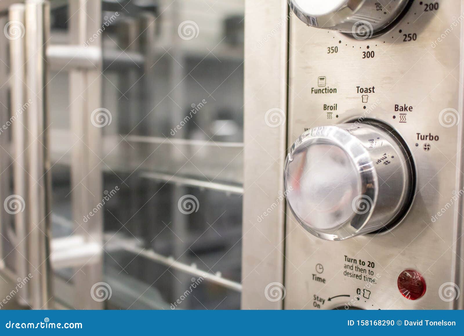 Buttons on an oven stock photo. Image of conventional - 158168290