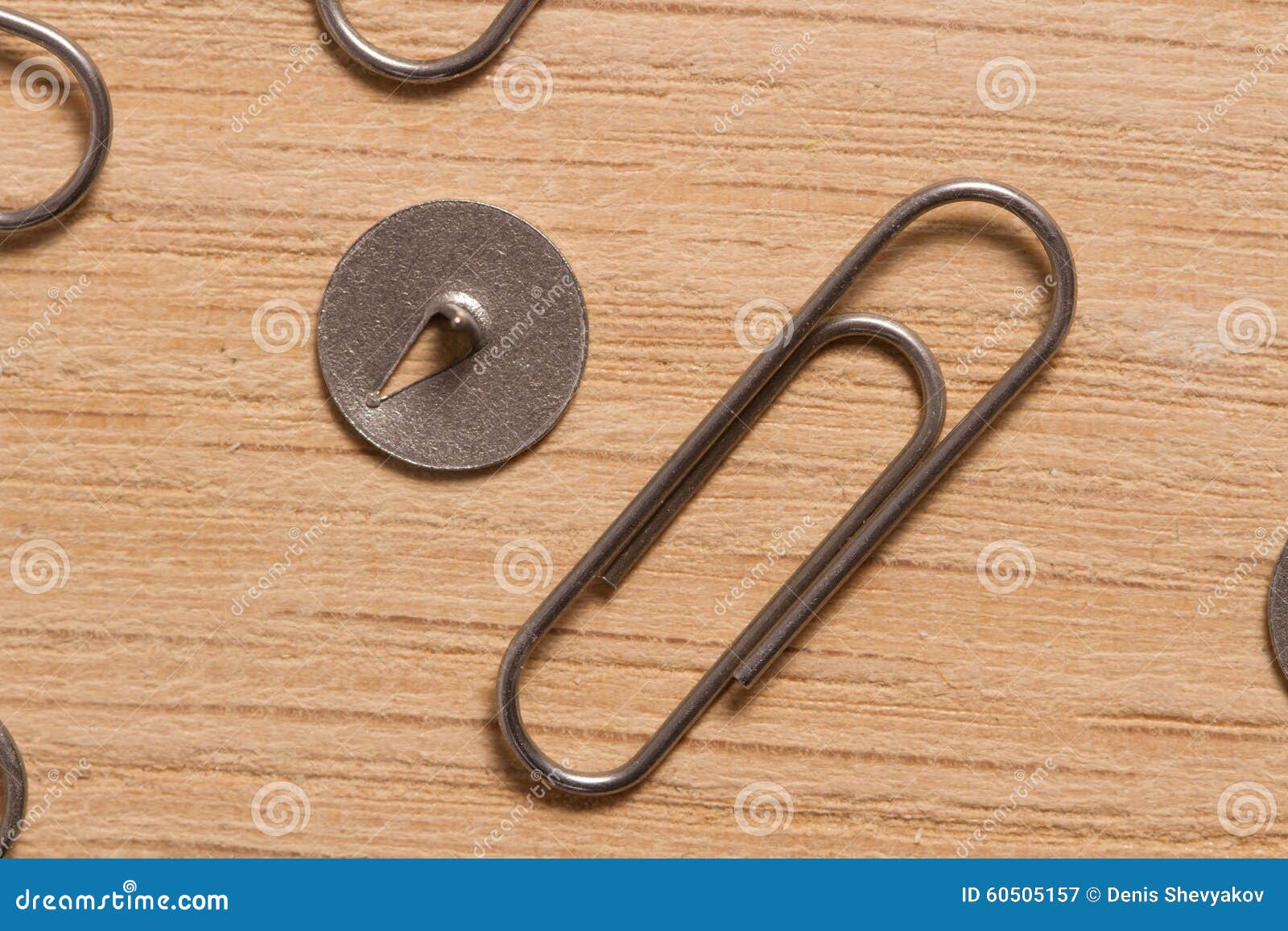 Buttons and Paper Clips on a Wooden Surface. Workshop Scale Models ...