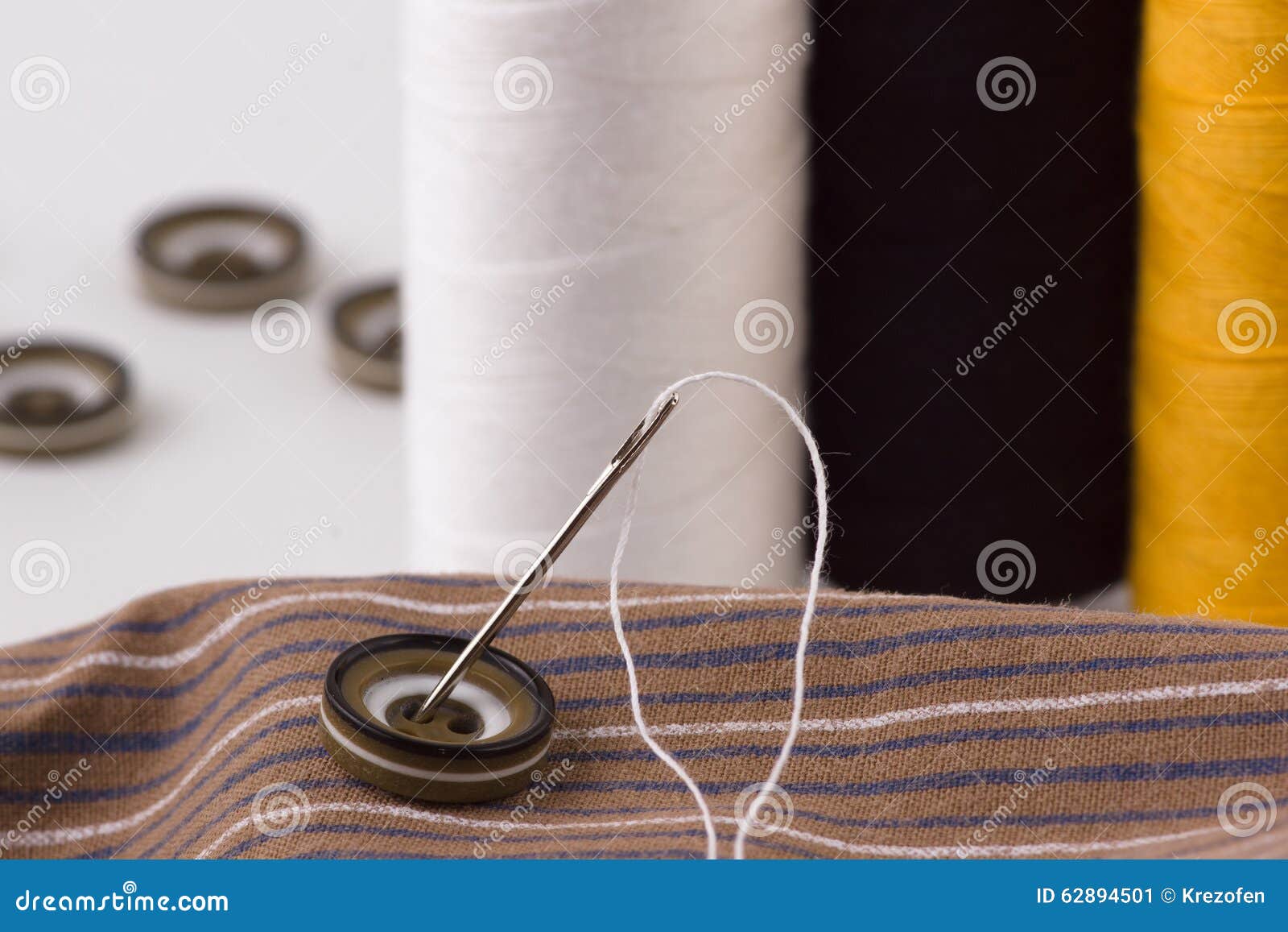 Buttons with a Thread and a Needle Stock Image - Image of manufacturing ...