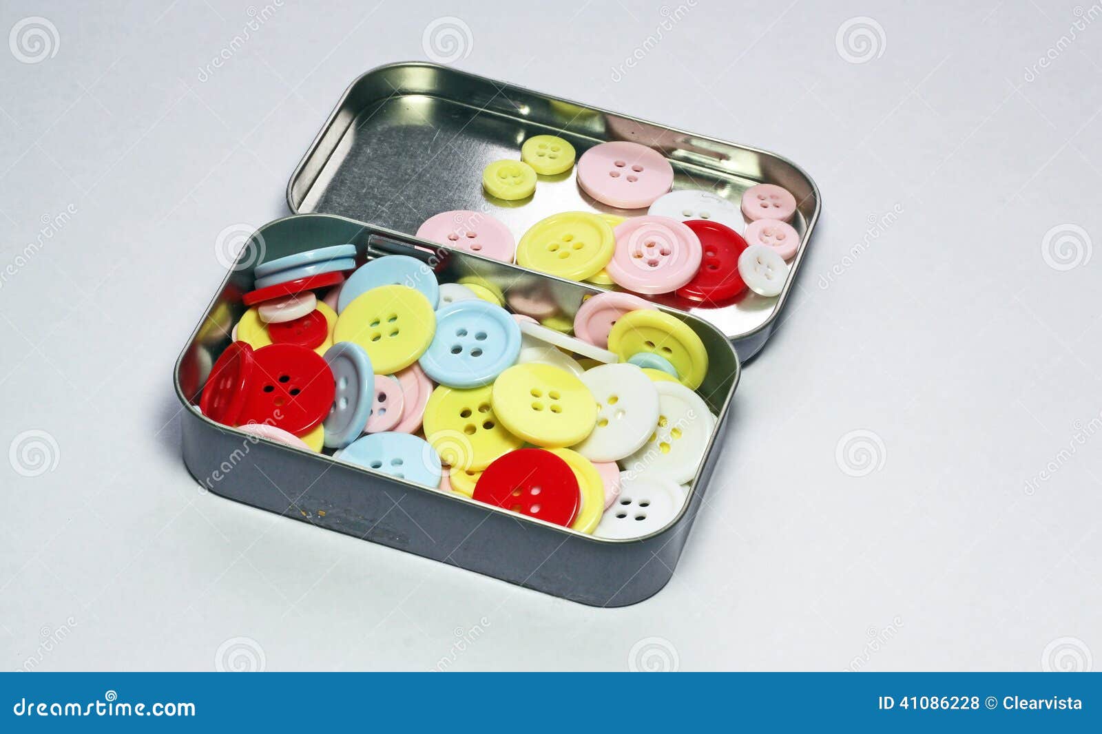 Buttons in a tin. stock photo. Image of sewing, fasten - 41086228