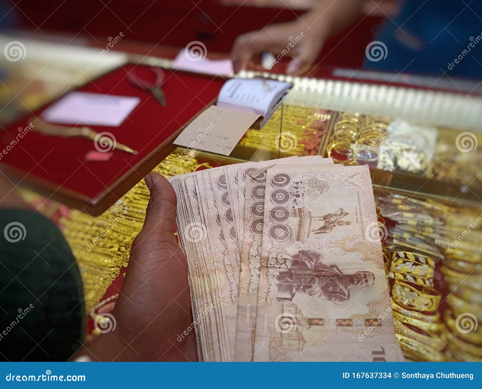 Buy gold at the gold shop stock photo. Image of dubai - 167637334