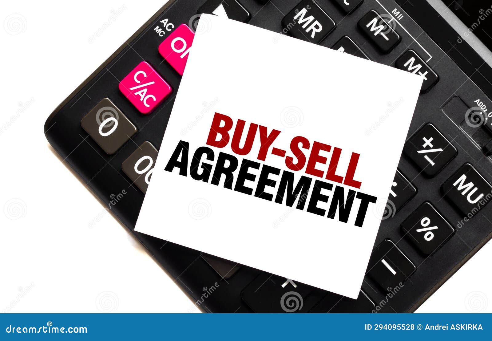 BUY-SELL AGREEMENT on White Sticker with Calculator on White Sticker ...