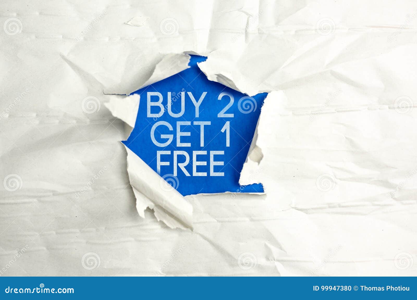 Buy two get 1 free stock photo. Image of advertising - 99947380