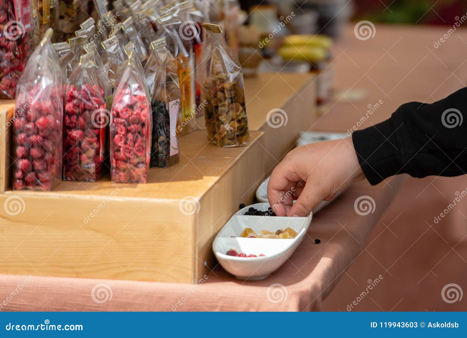 The Buyer Will Take Candy from the Bowl of Sweets Tasting Sample Stock ...
