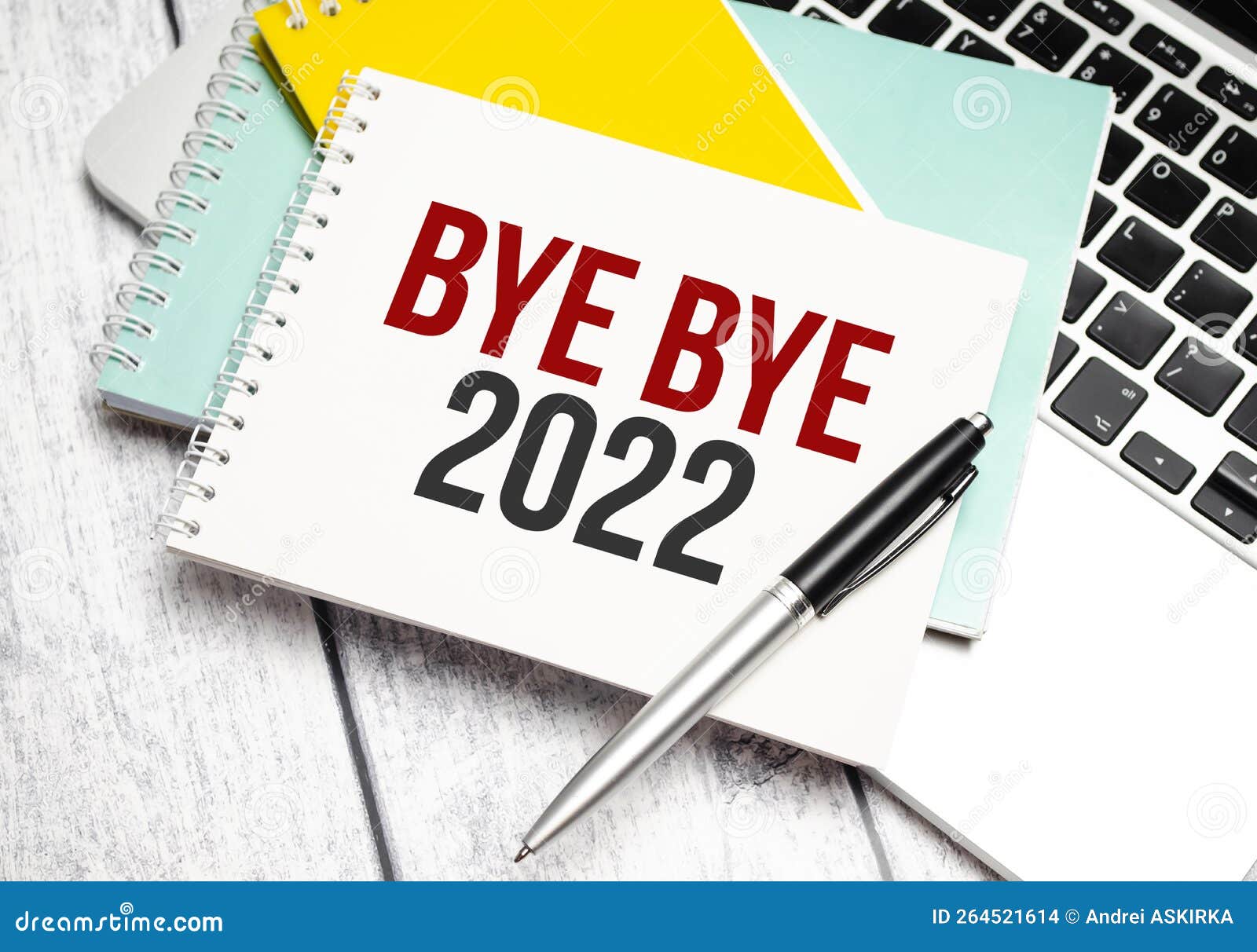 BYE BYE 2022 . Conceptual Background with Chart ,papers and Pen Stock ...