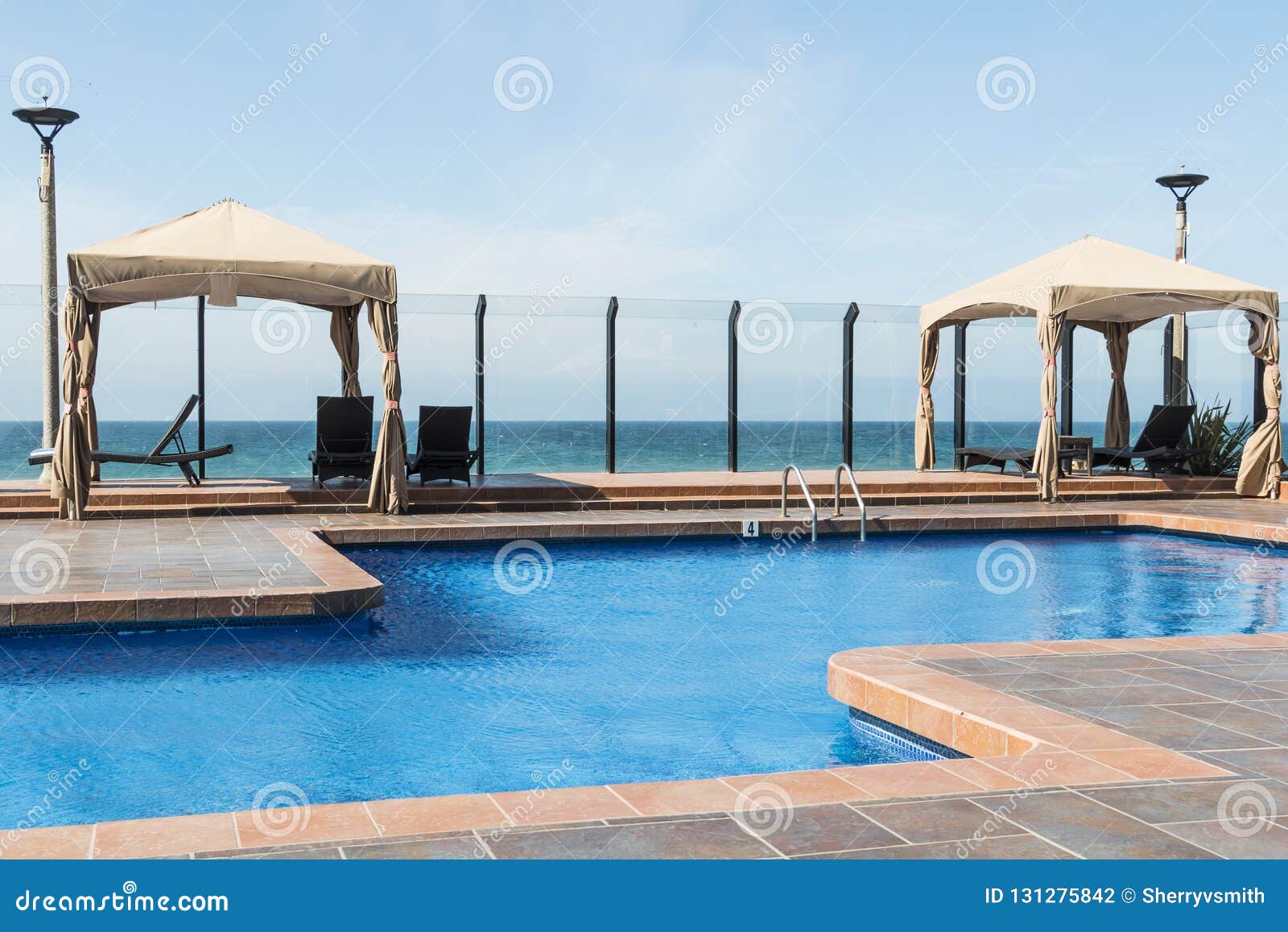 Poolside Cabanas in Ensenada, Mexico Stock Photo - Image of carefree ...