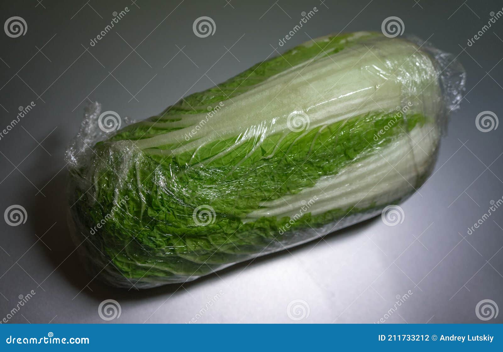 Cabbage for the Kitchen in Plastic Wrap on Silver Isolate Stock Photo ...