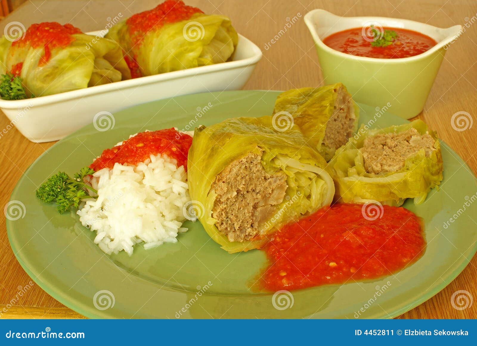 Cabbage Rolls In A Plate On A Wooden Table Stock Photo | CartoonDealer ...