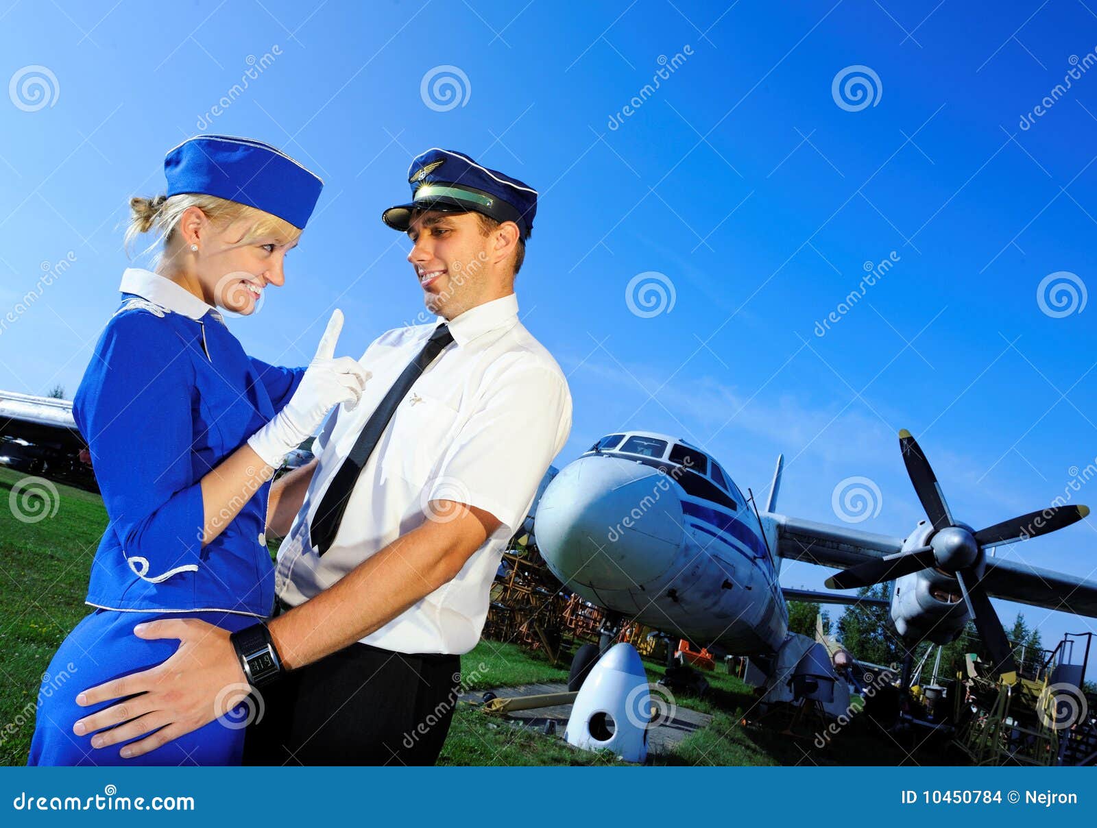 Cabin crew couple stock photo. Image of plane, smiling - 10450784