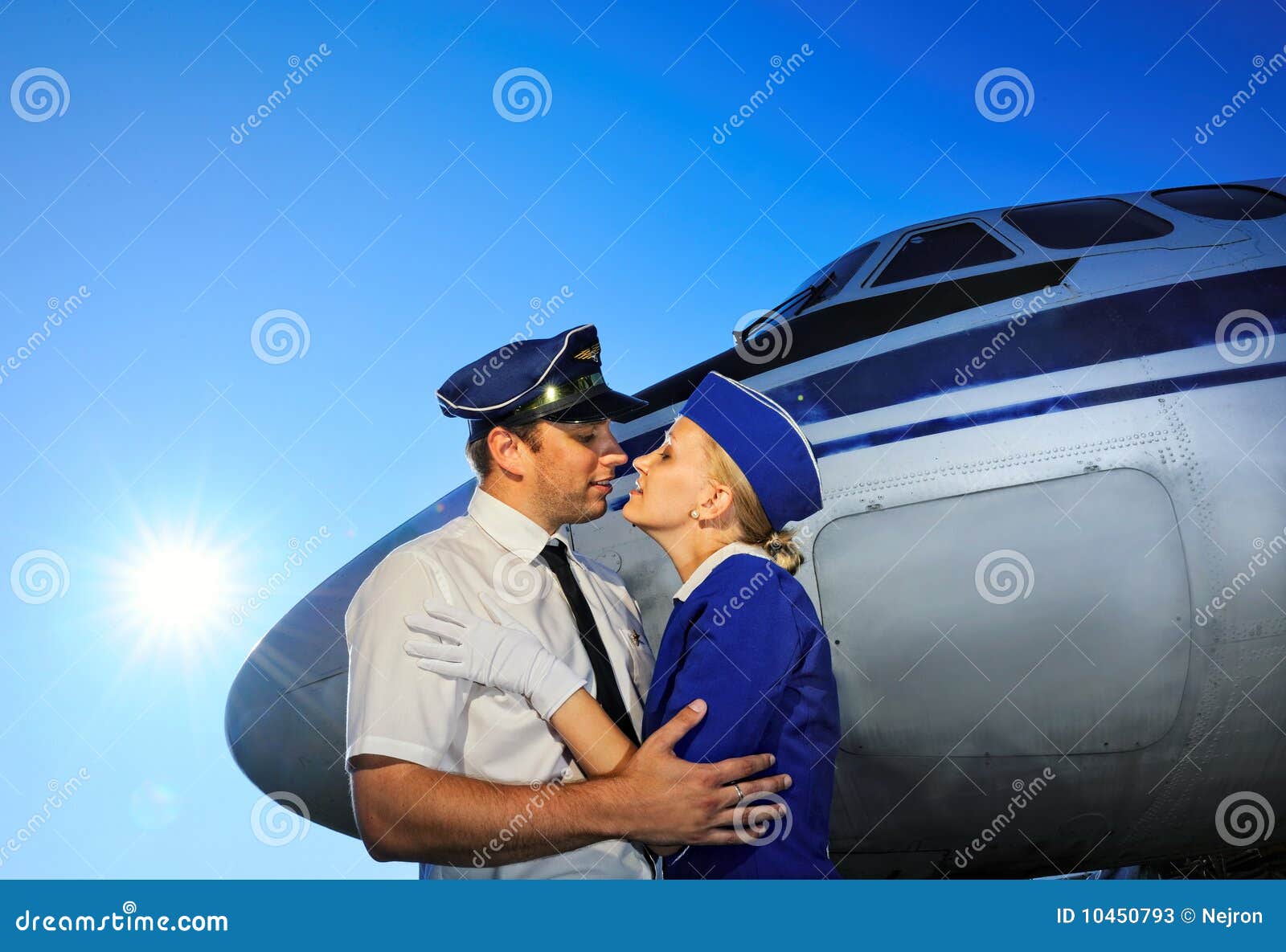 Cabin crew couple stock image. Image of beauty, plane - 10450793