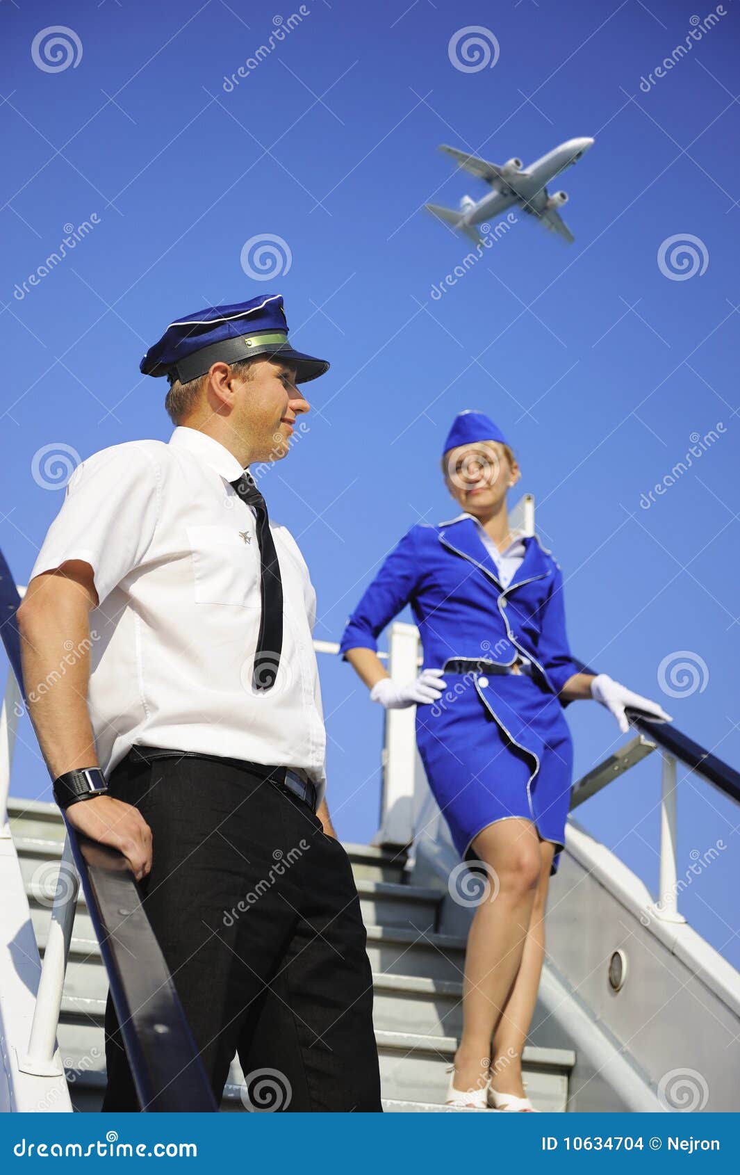 Cabin Crew Members Standing Together At Airfield Stock Photography ...
