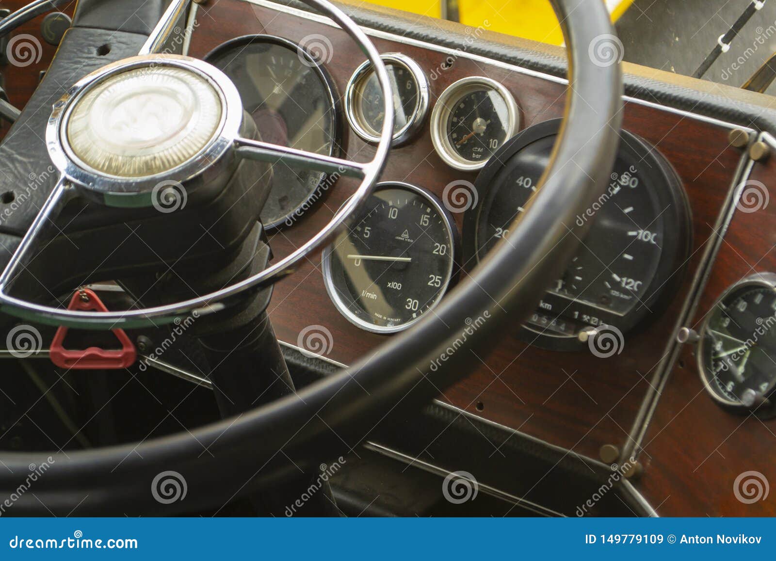 The Cabin of the Old Bus. Vintage Dashboard. Leather Steering Wheel ...