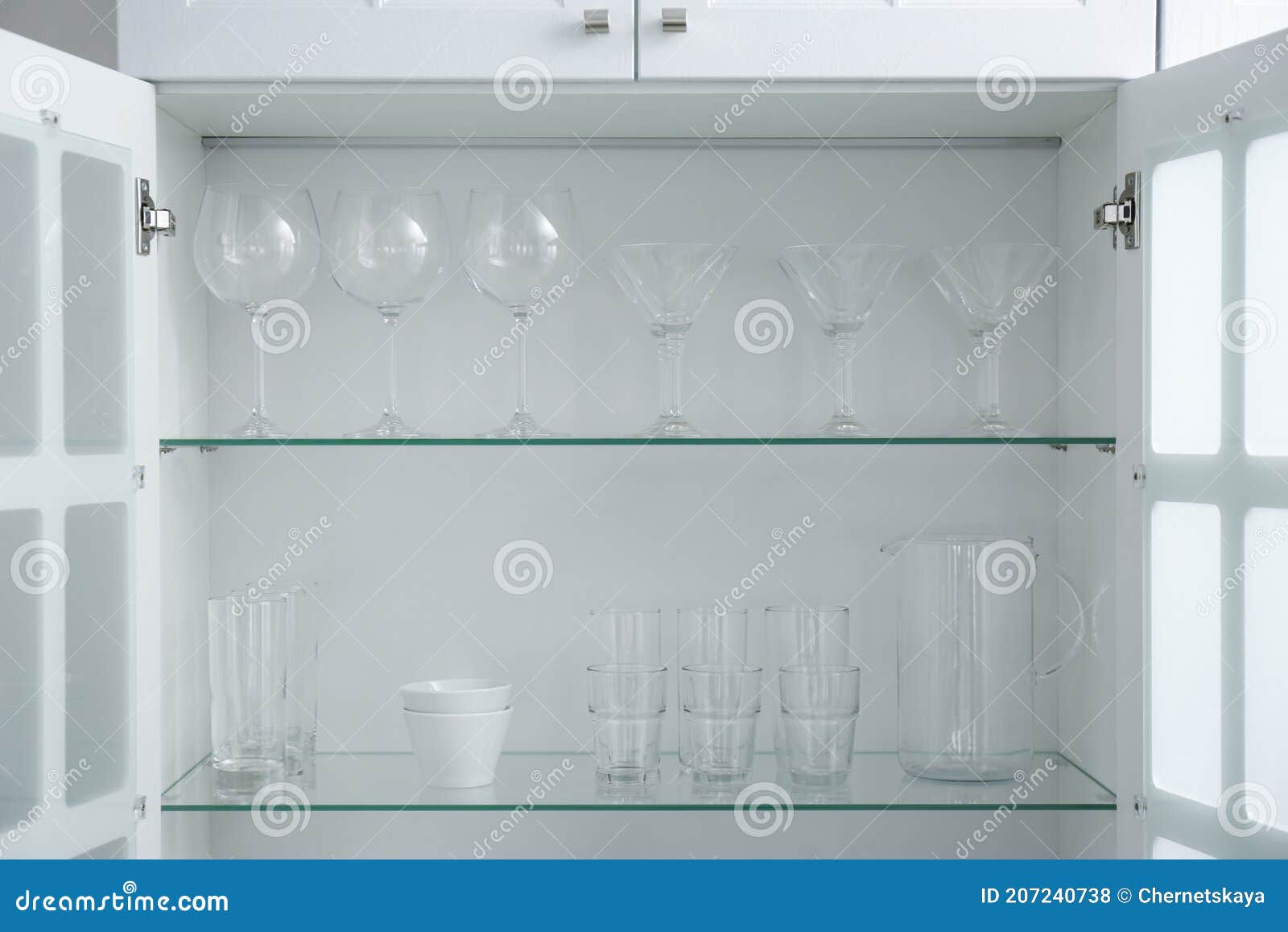 Cabinet with Crockery and Glassware. Order in Kitchen Stock Photo ...
