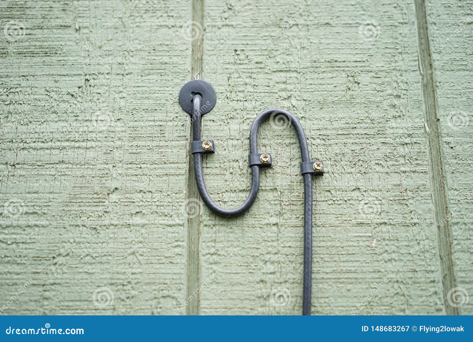 Cable Attached To Side of Building Stock Image - Image of home, wire ...