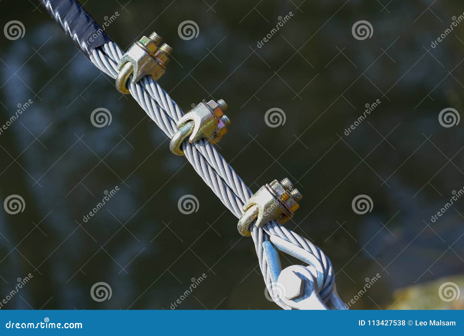 Cable with bolts and nuts stock photo. Image of closeup - 113427538