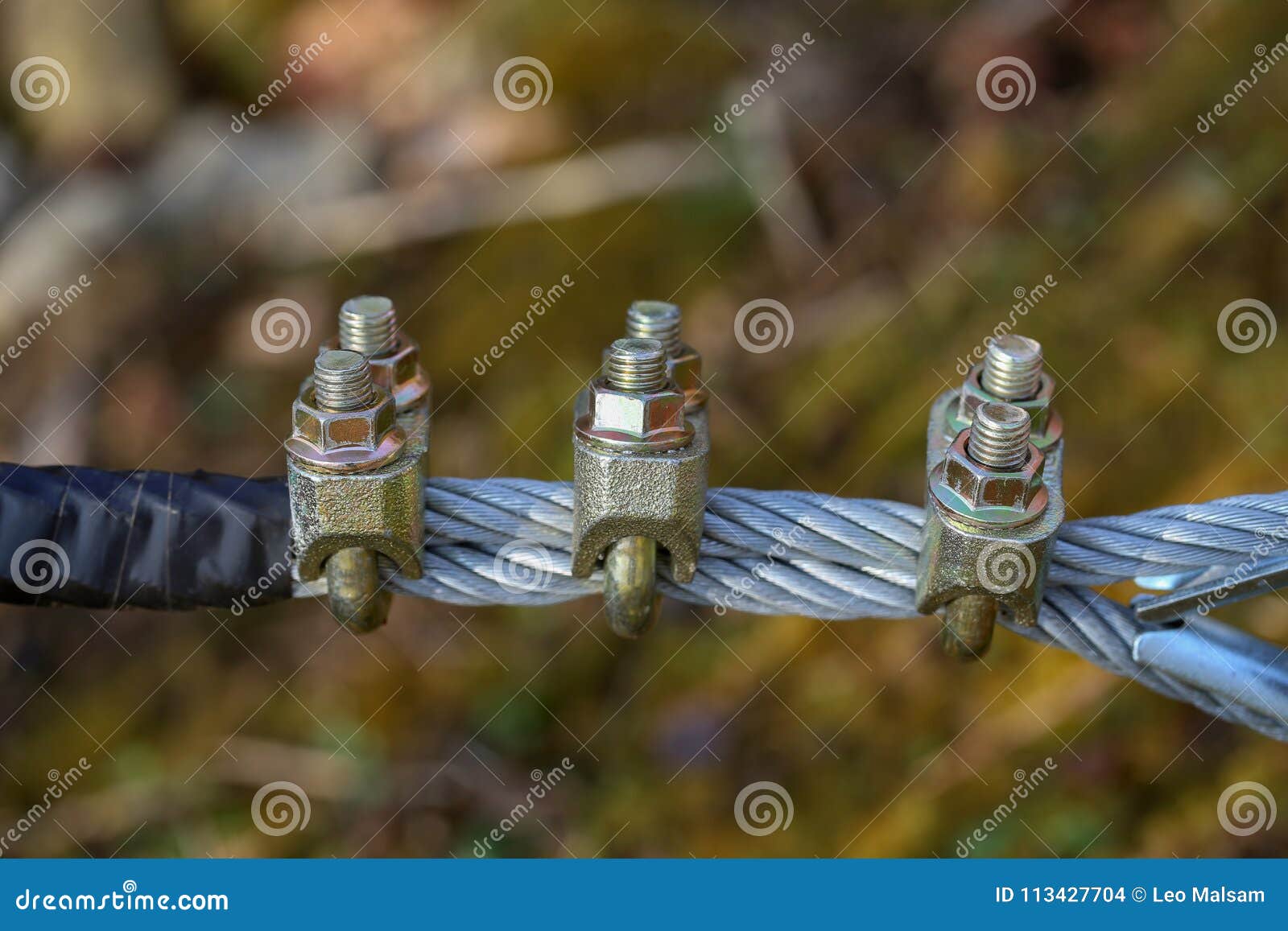 Cable with bolts and nuts stock photo. Image of nuts - 113427704