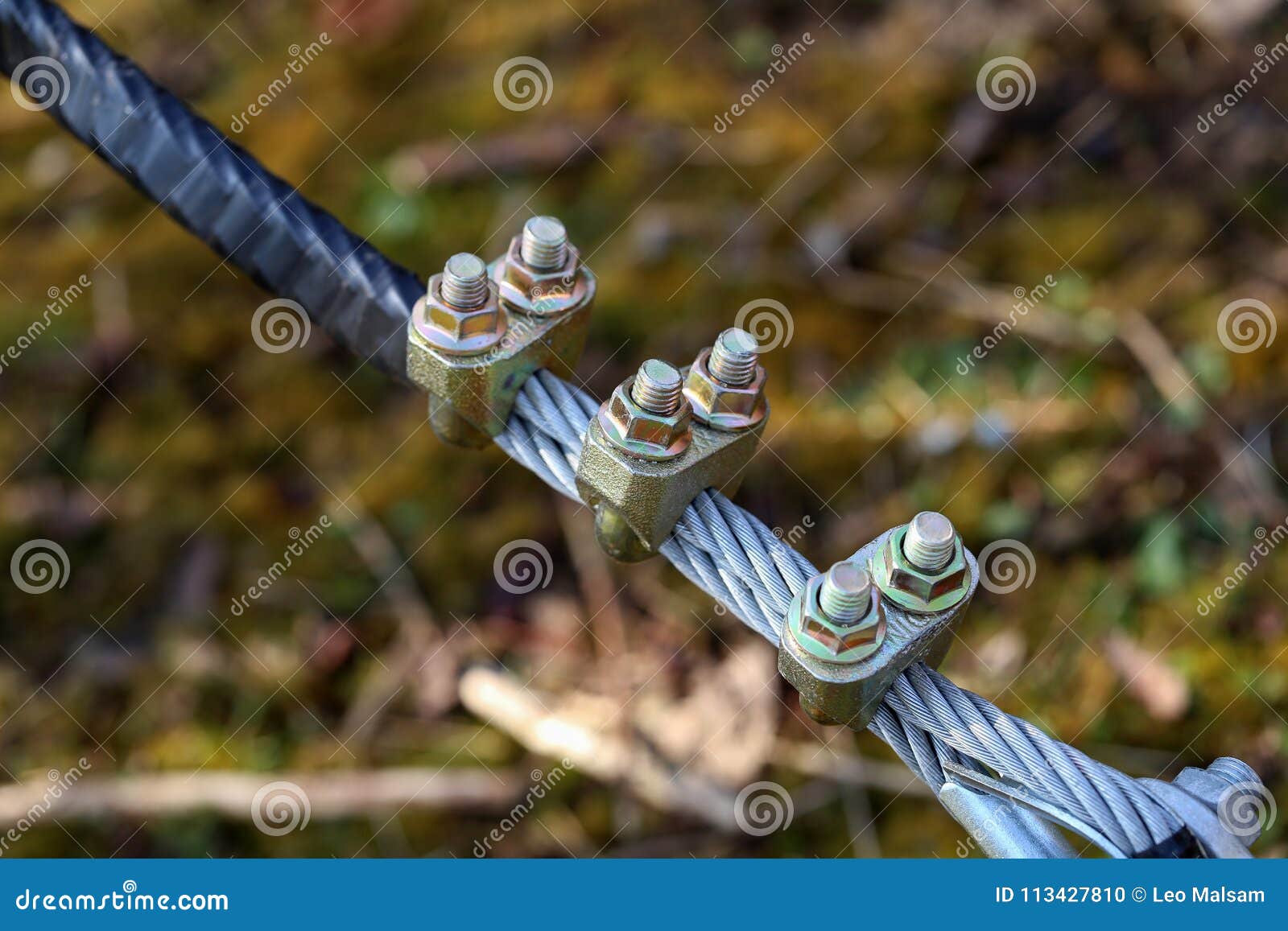 Cable with bolts and nuts stock photo. Image of saddle - 113427810