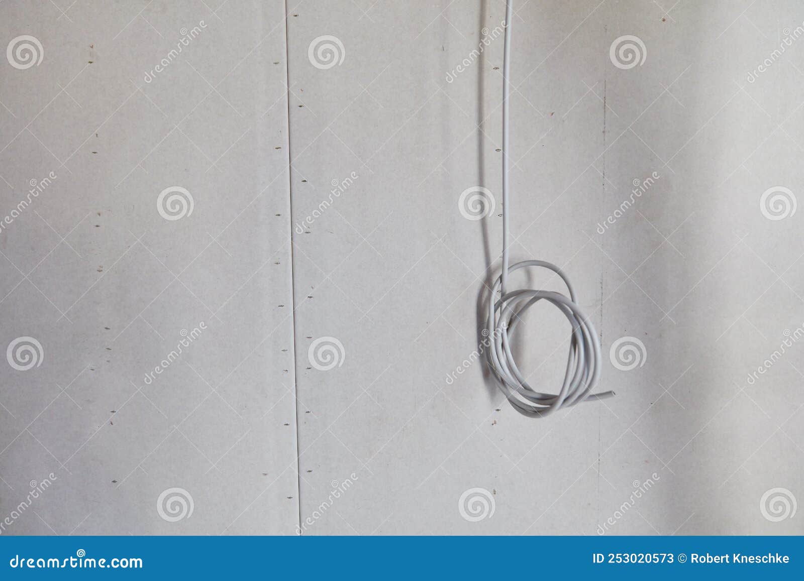 Cable Hangs from the Ceiling for Electrical Installation in New ...