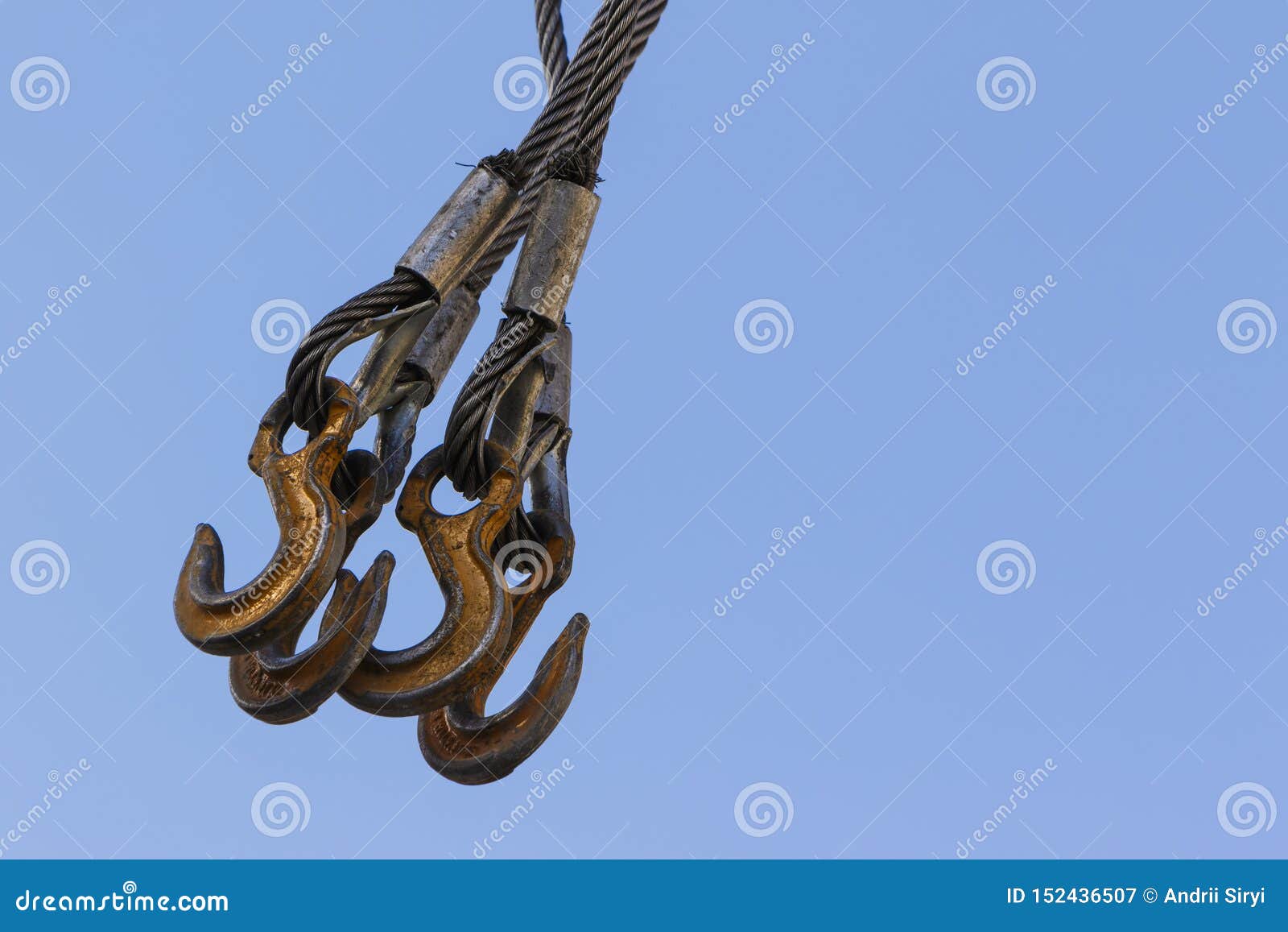 Cable with Hooks Against the Background of the Blue Sky. Stock Image ...