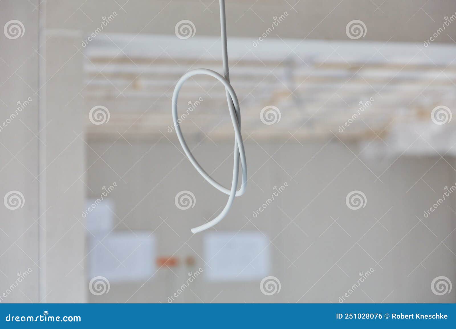Cable with Knots Hangs from the Ceiling during Interior Work Stock ...