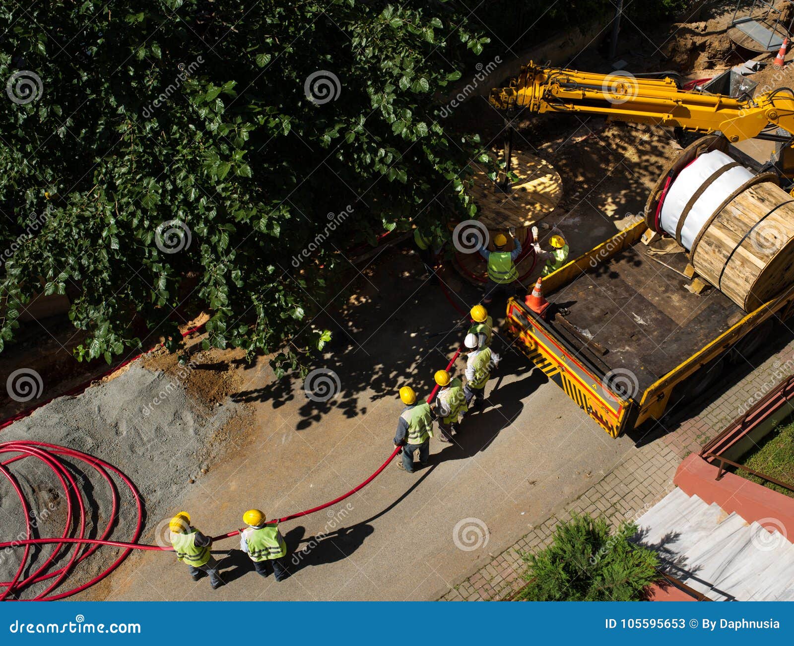 Cable-laying workers stock image. Image of boom, project - 105595653